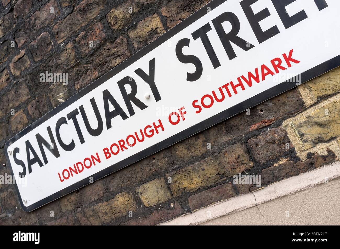Street name sign for Sanctuary Street in the borough of Southwark in ...
