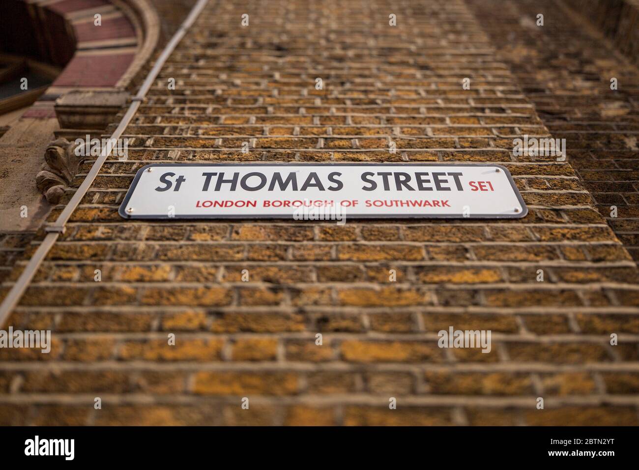 Street name sign for St Thomas Street in the SE1 area of the London ...