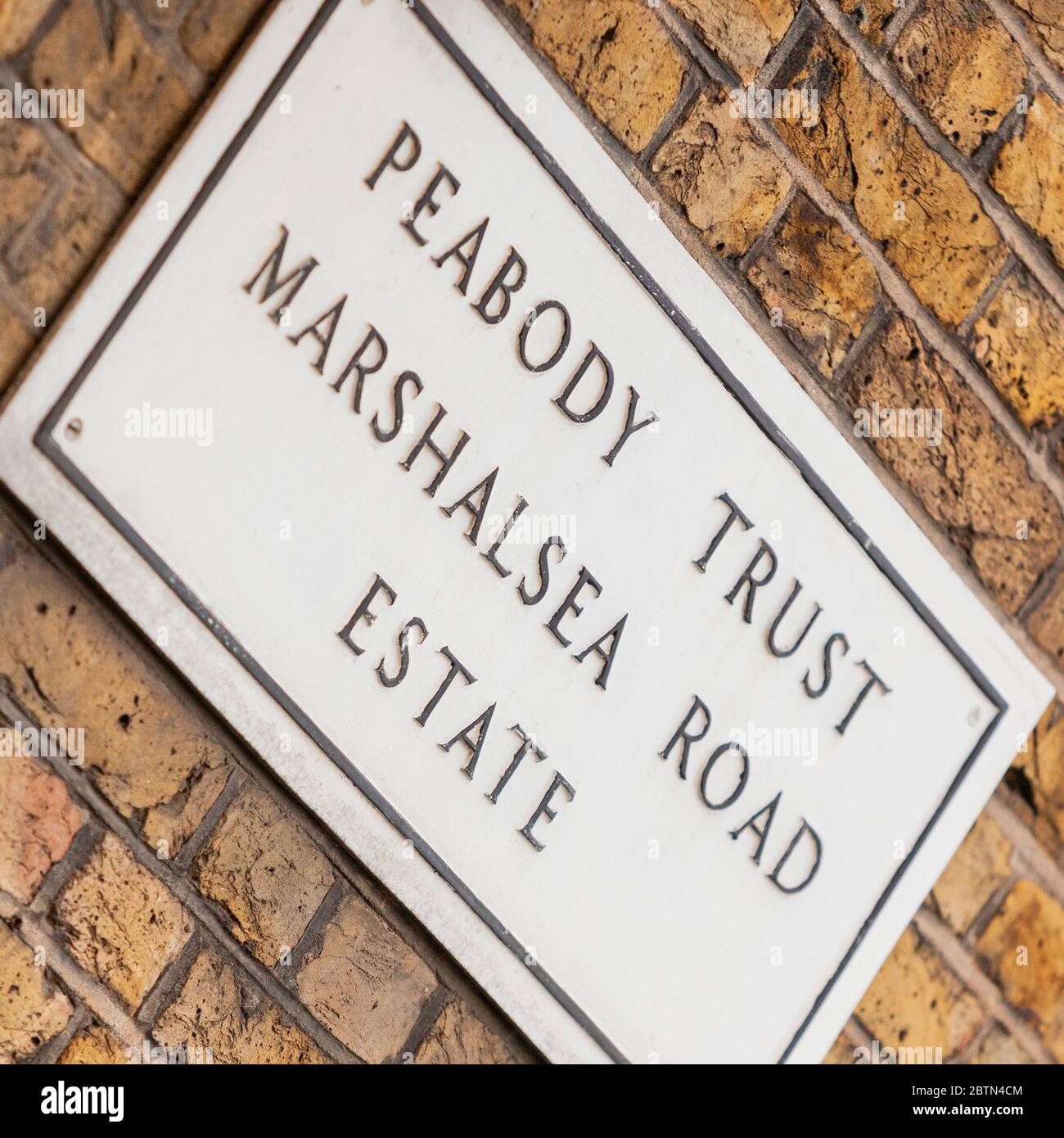 Nameplate attached to the wall of the Peabody Trust Marshalsea Road ...