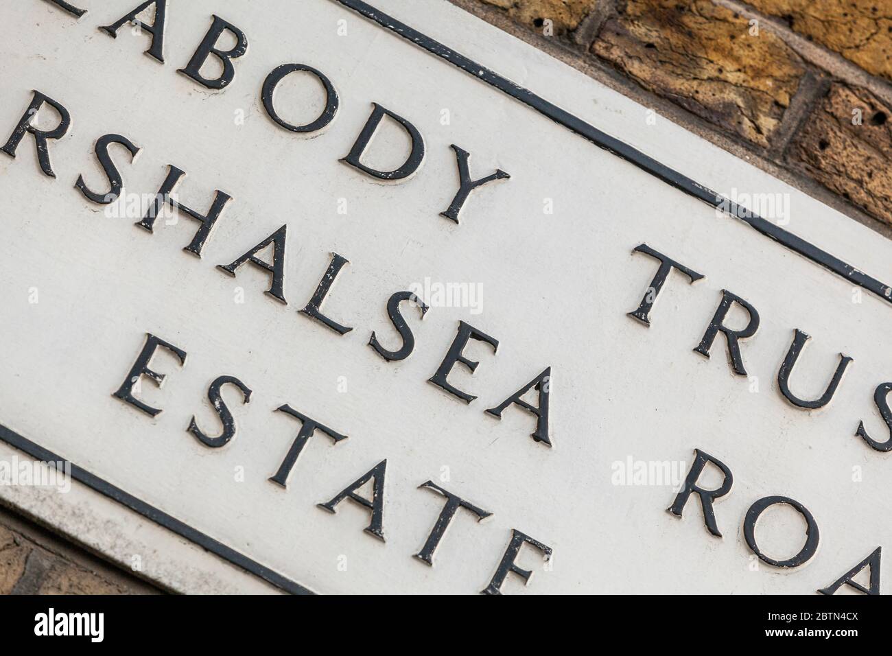 Nameplate attached to the wall of the Peabody Trust Marshalsea Road ...