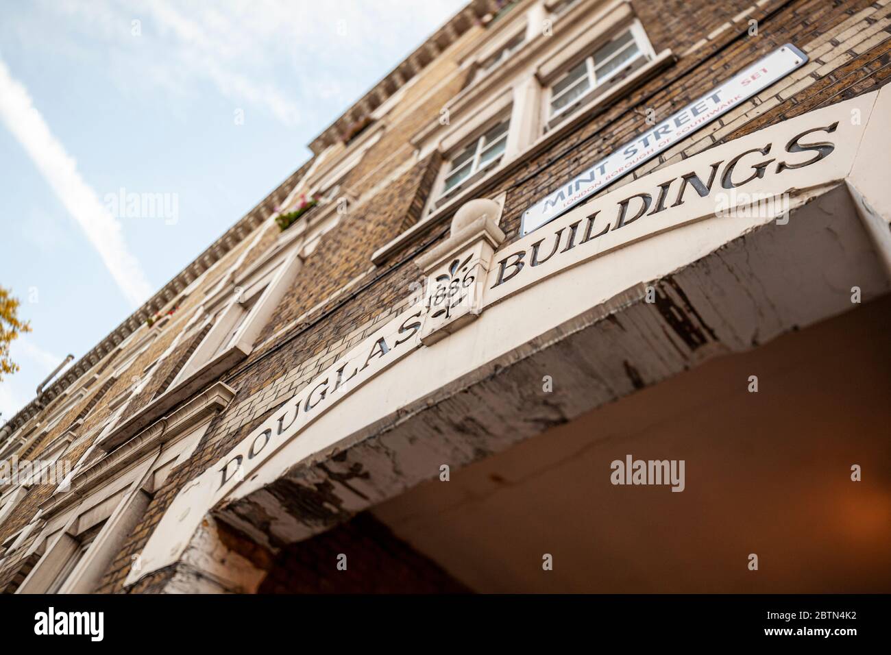 Arched sign for the Douglas Buildings of the Peabody Estate in London ...