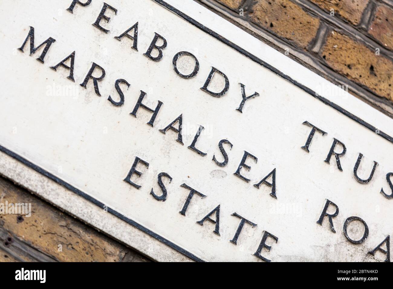 Nameplate attached to the wall of the Peabody Trust Marshalsea Road ...