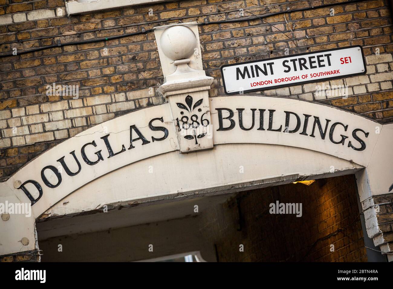 Sign belonging to Douglas Flats in the Douglas Buildings, part of the ...