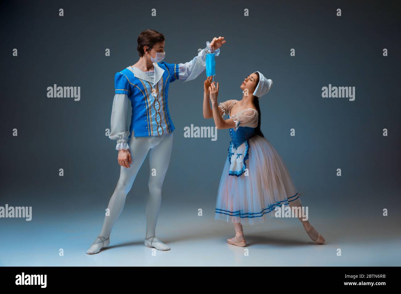 Modern Cinderella not trying the slipper on, but protective face mask ...