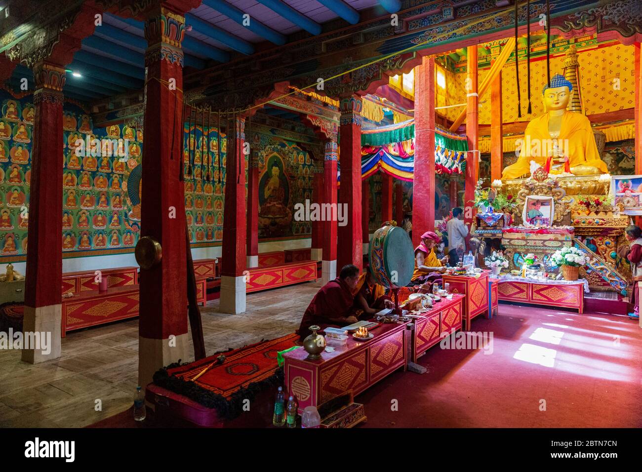 Inside the Hemis Monastery, Monks Pray infront of Buddha´s Statue Stock ...
