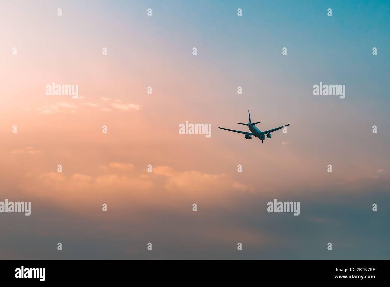 Aircraft flying over clouds, aviation sunset background, essential ...