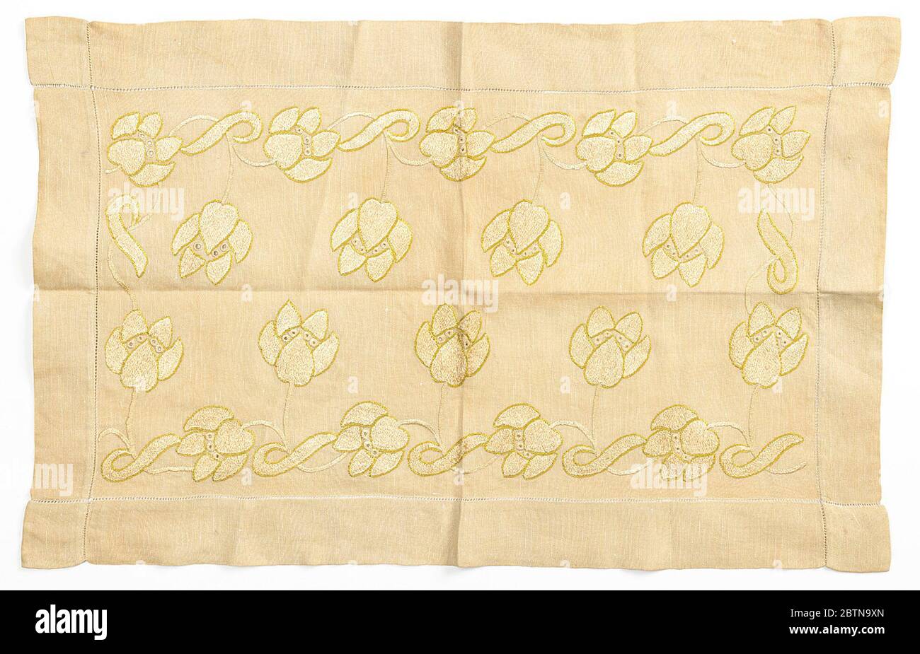 Runner. Off-white runner with creamy white flowers outlined in yellow ...