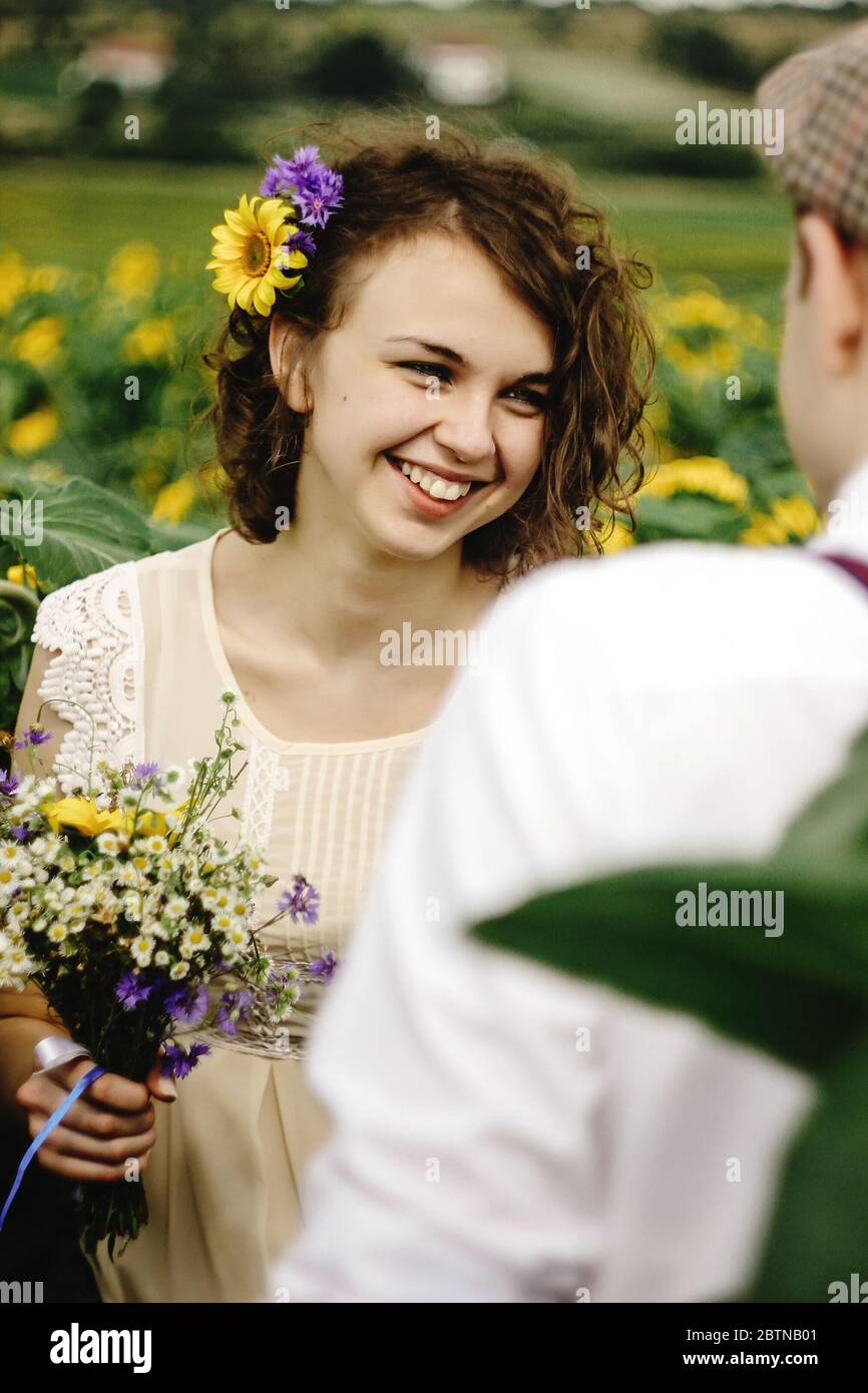 beautiful gorgeous bride and stylish handsome groom, joyful rustic ...