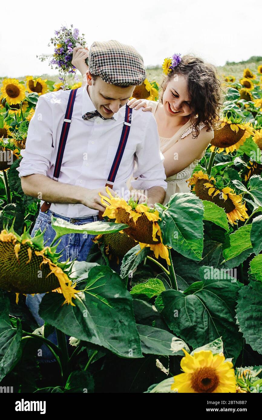 beautiful gorgeous bride and stylish handsome groom, joyful rustic ...
