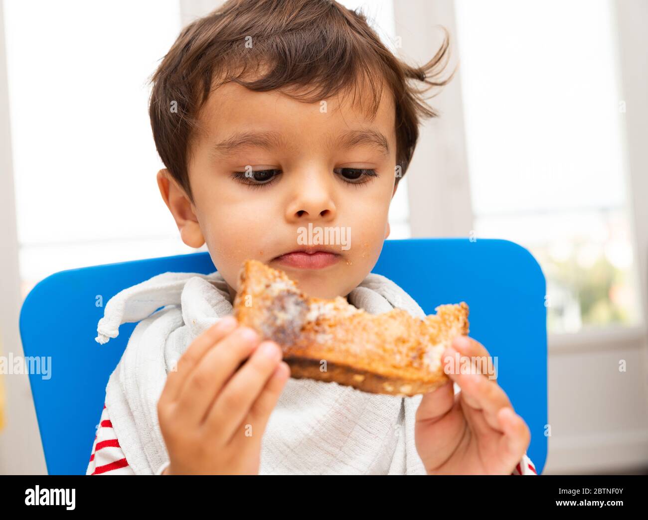Child bread butter eating hi-res stock photography and images - Alamy