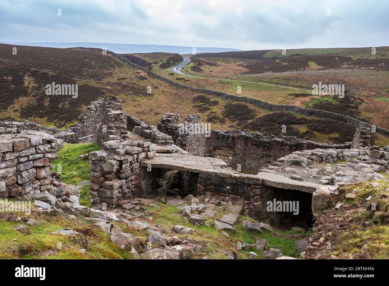 The twin flues exiting from the rear of the ruins of the smelter at ...