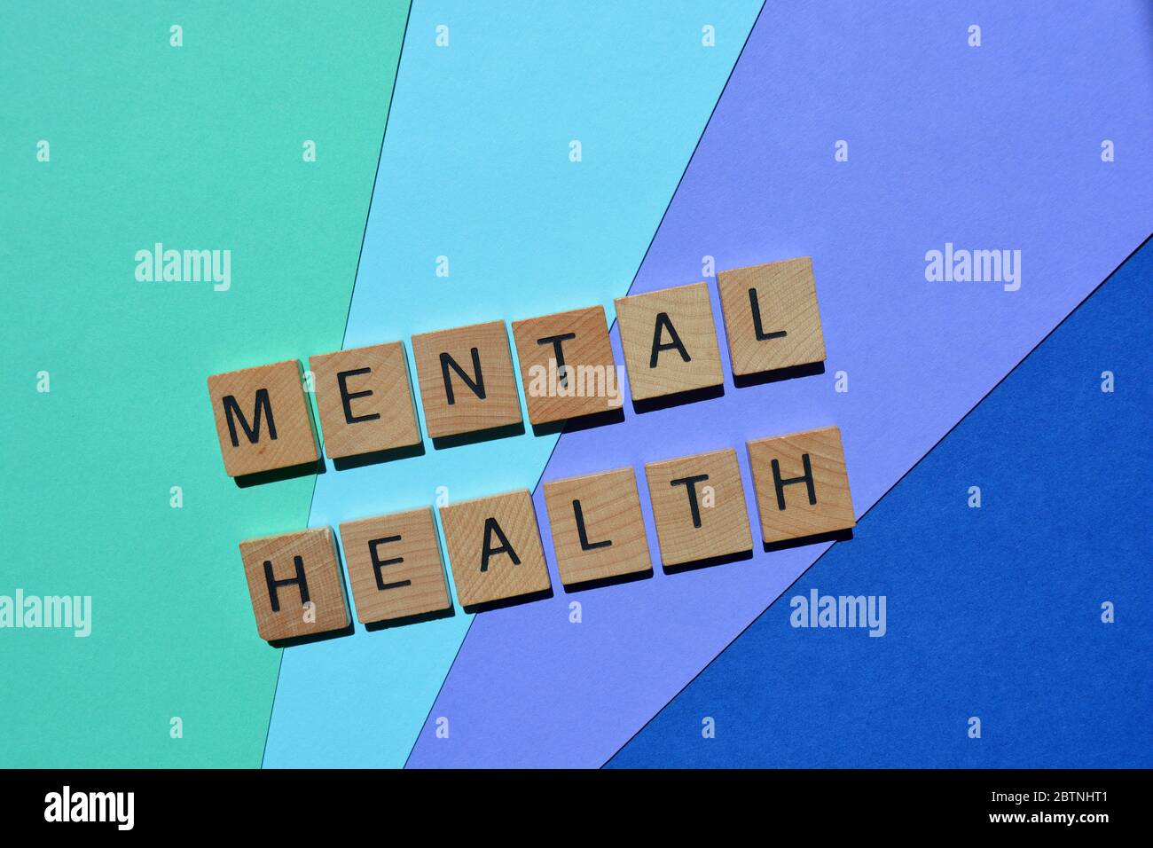 Mental, Health, words isolated on blue background Stock Photo - Alamy