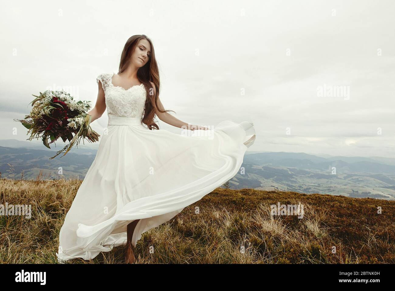 Bride alone happy outdoors hi-res stock photography and images - Alamy