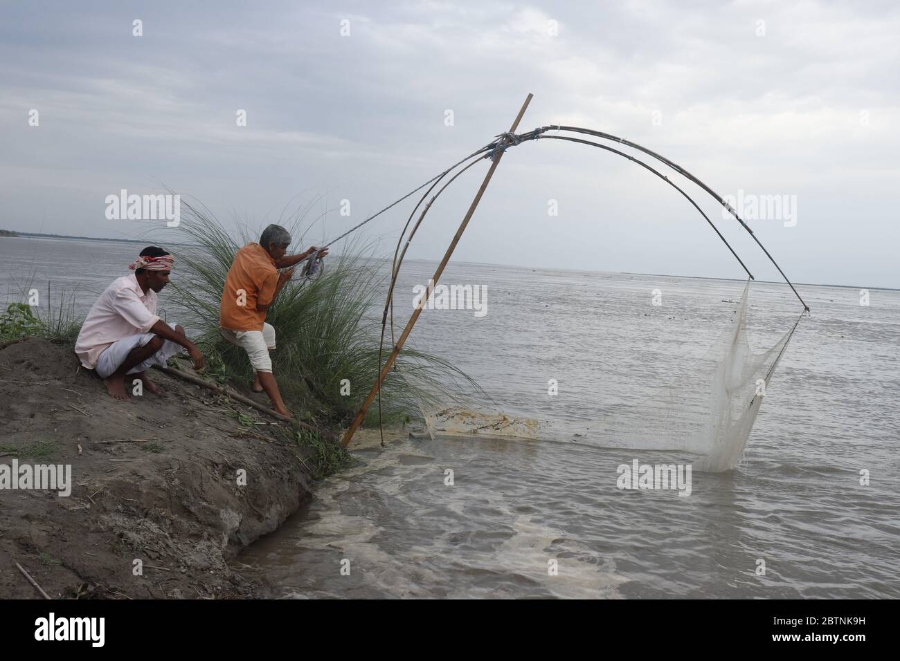 Villager fishing hi-res stock photography and images - Alamy