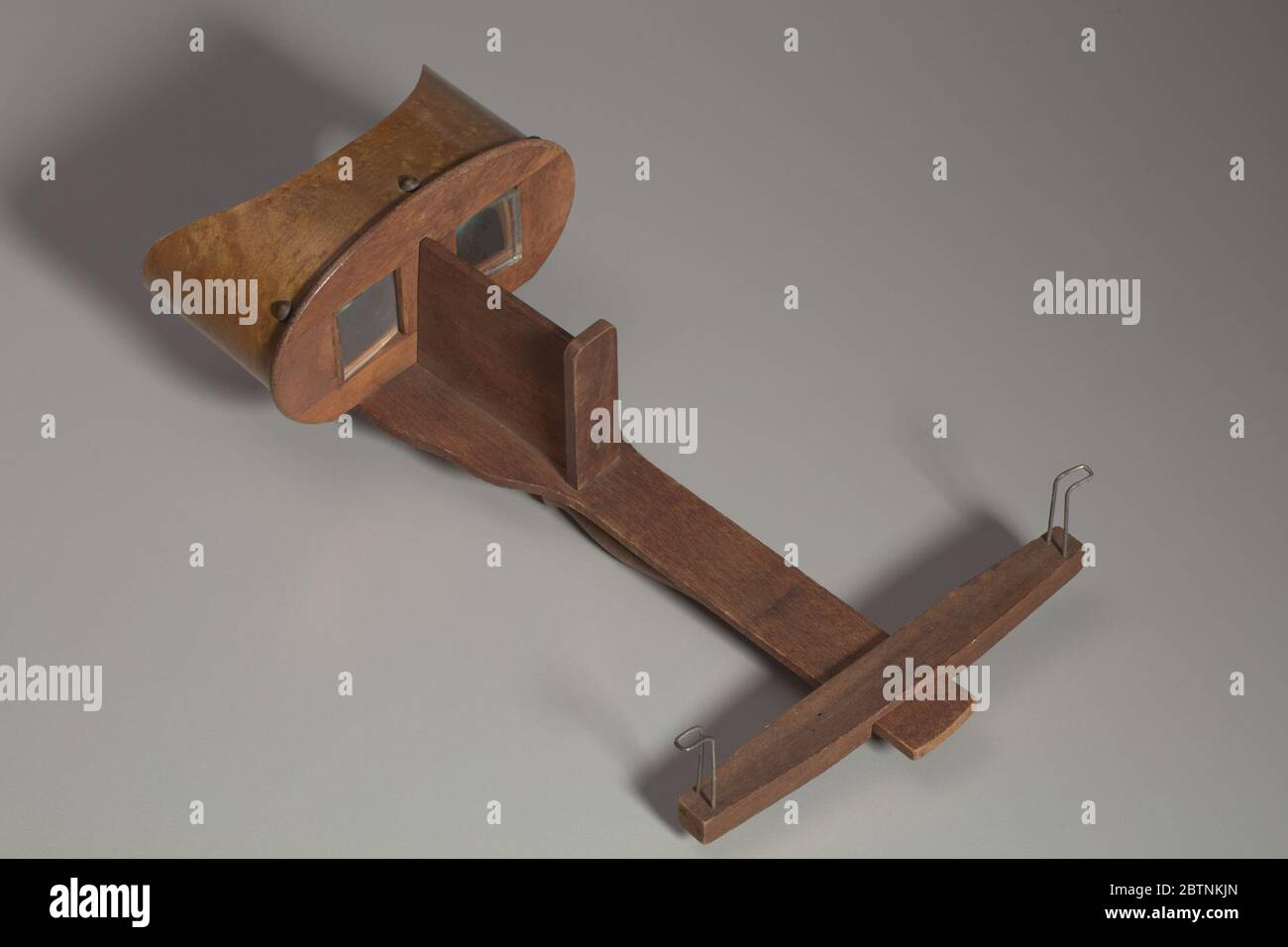 Wooden stereoscope. This stereoscope has a wooden view box, holder ...