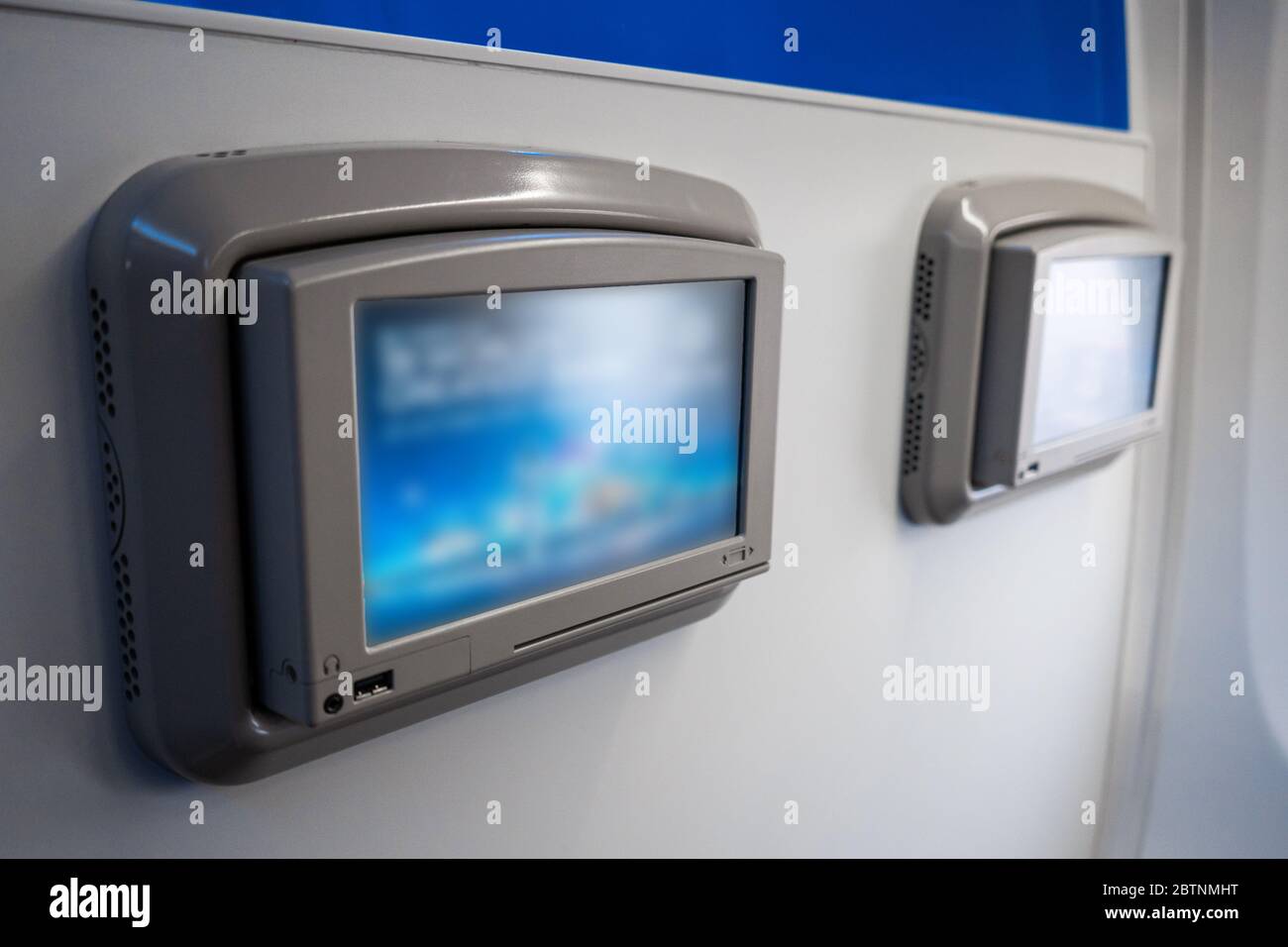 The interior of the aircraft. Empty airplane cabin. Rows of passenger ...