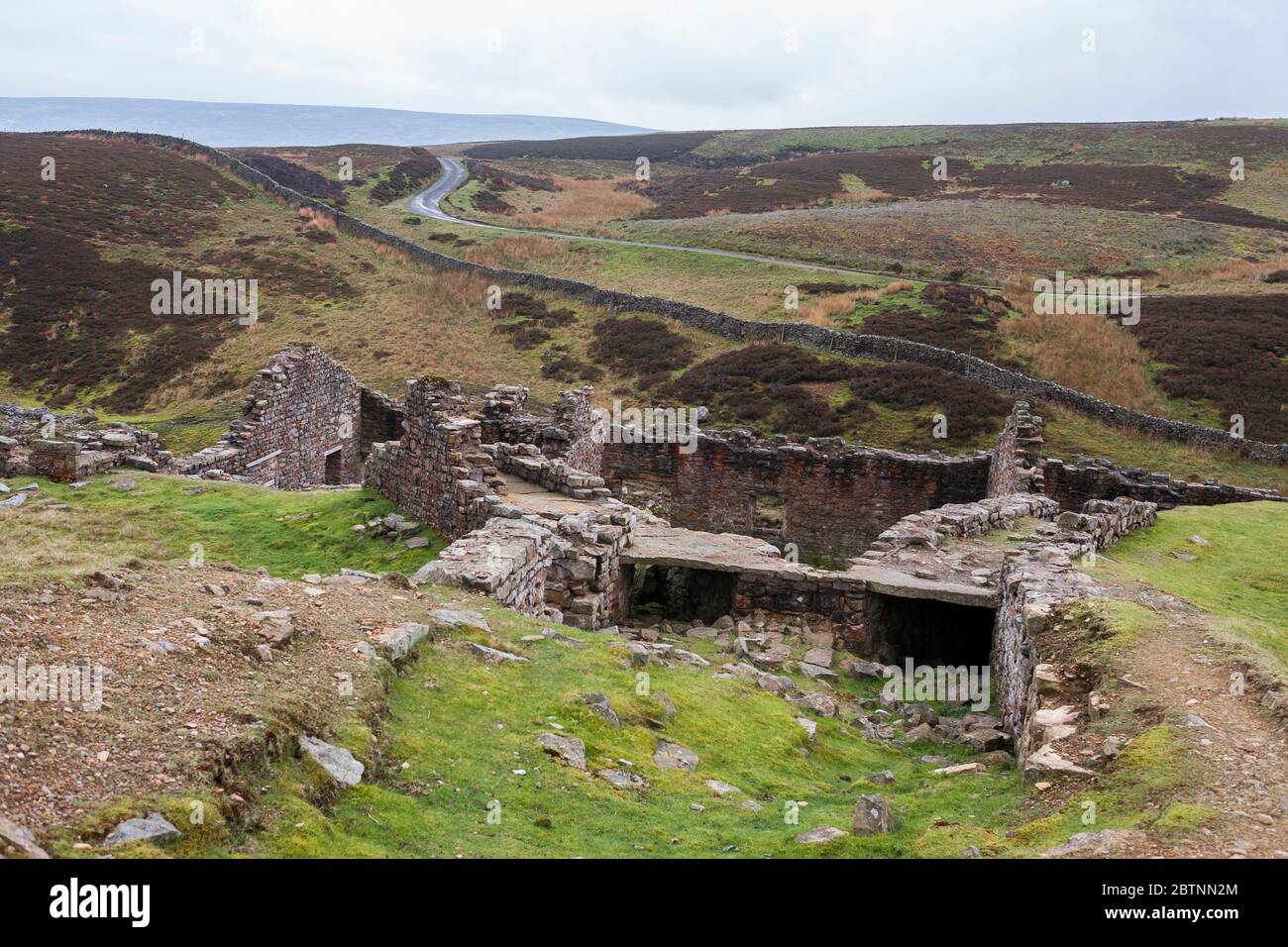 The twin flues exiting from the rear of the ruins of the smelter at ...