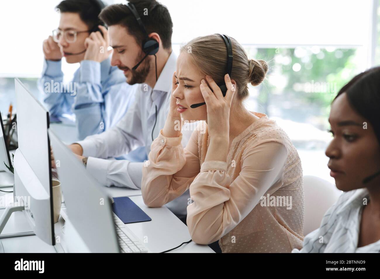 Working in front of computer hi-res stock photography and images - Alamy
