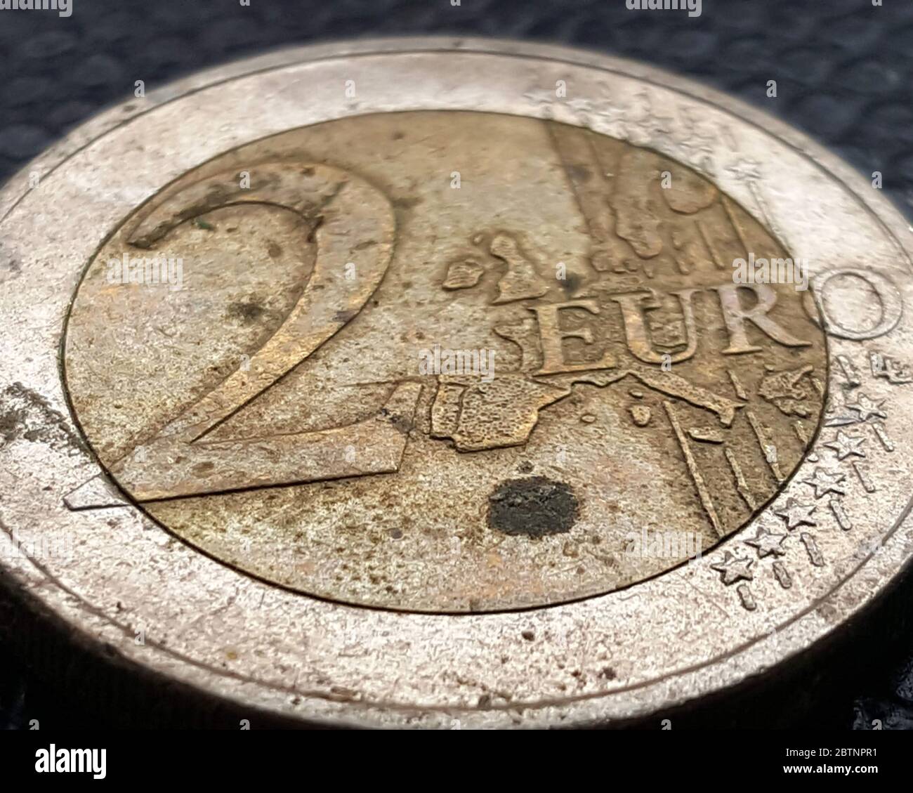 dirty and dusty coin on black background.euro cent Stock Photo - Alamy