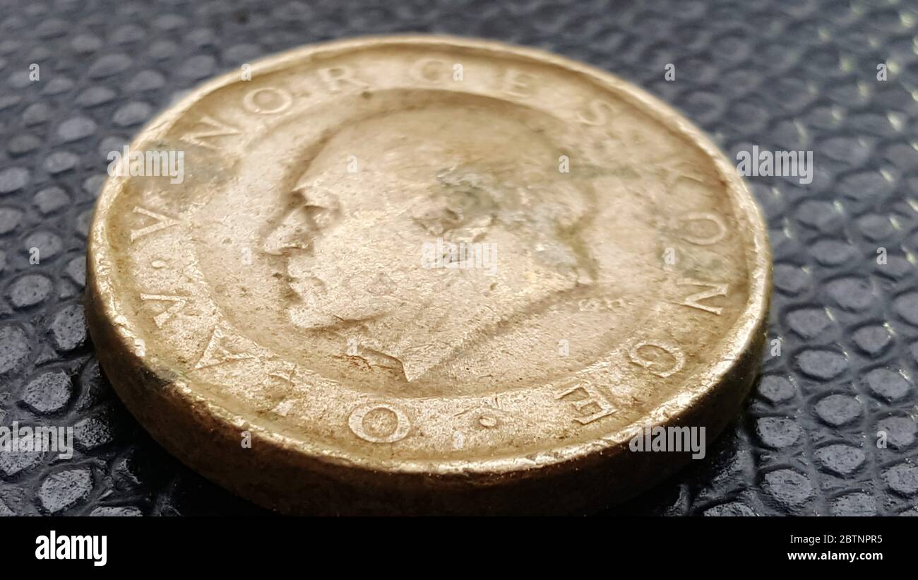 dirty and dusty coin on black background.norway money Stock Photo - Alamy