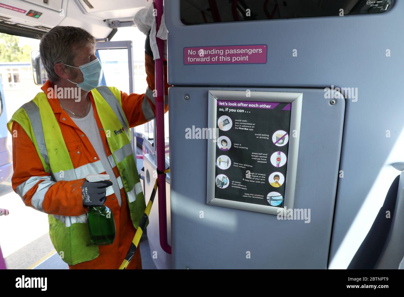 Cleaner James York from First Bus cleans a bus at their Larbert depot ...