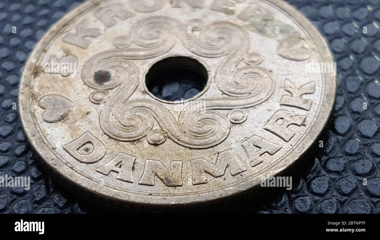 dirty and dusty coin on black background,denmark money Stock Photo - Alamy