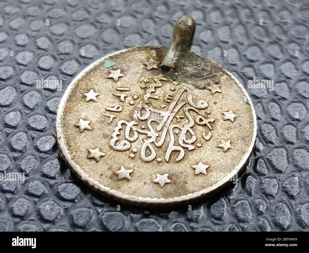 dirty and dusty coin on black background,ottoman money Stock Photo - Alamy