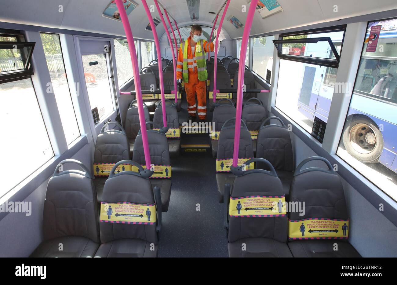 Cleaner James York from First Bus cleans a bus at their Larbert depot ...