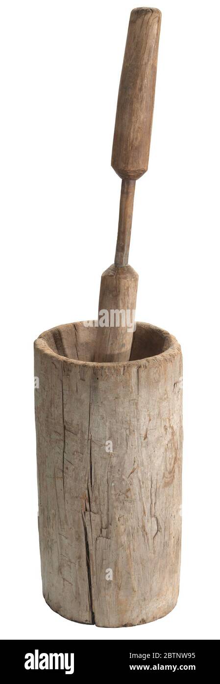 Mortar and pestle for pounding grain. A handcarved mortar (.1) and ...