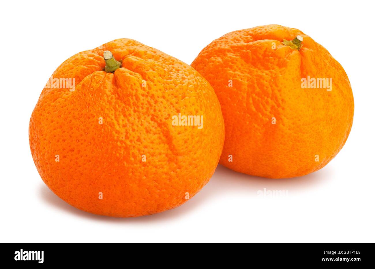 Two fresh ripe tangerines Cut Out Stock Images & Pictures - Alamy