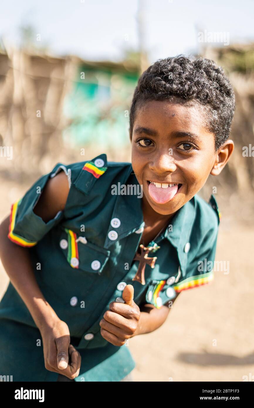 Playful little boy sticking out tongue, Abala, Afar Region, Ethiopia ...