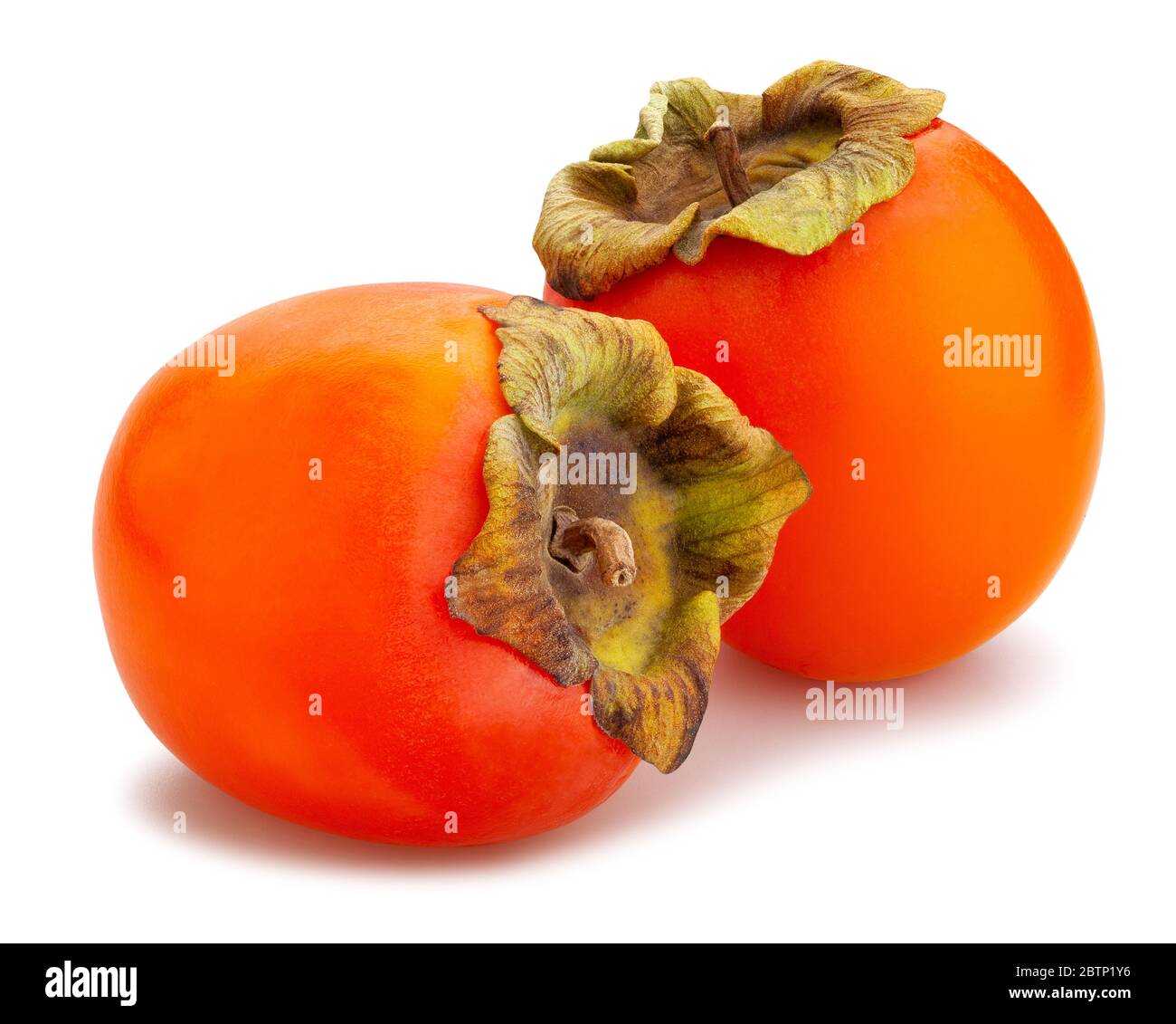 Fresh bright whole persimmon Cut Out Stock Images & Pictures - Alamy