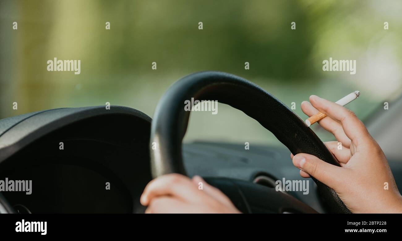Girl smoking by window hi-res stock photography and images - Alamy