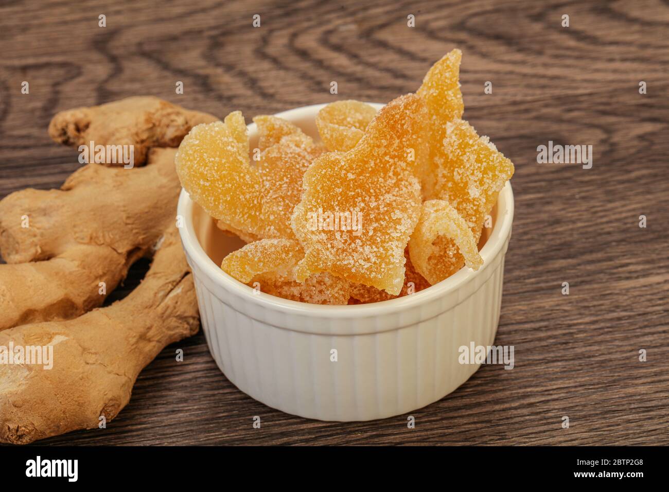 Dry sweet ginger snack in the bowl Stock Photo - Alamy