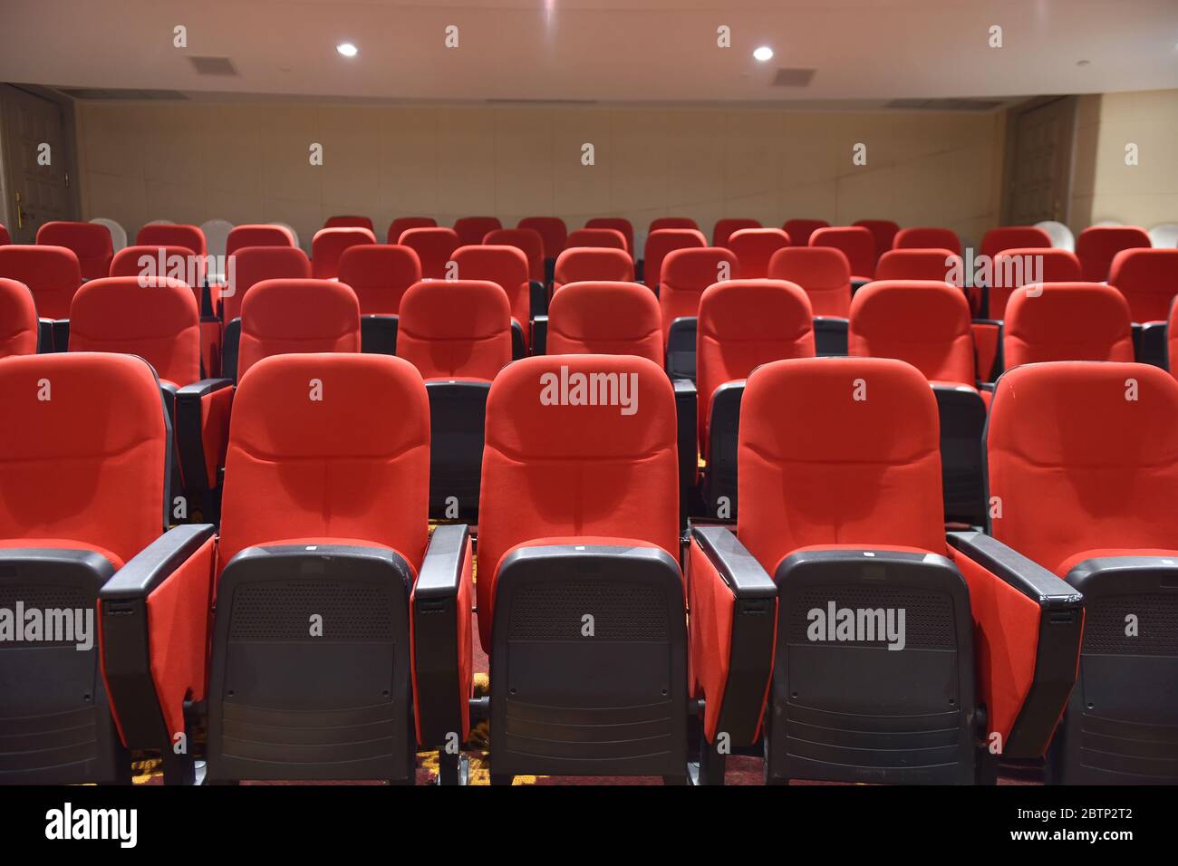 Red chairs in the meeting room Stock Photo - Alamy