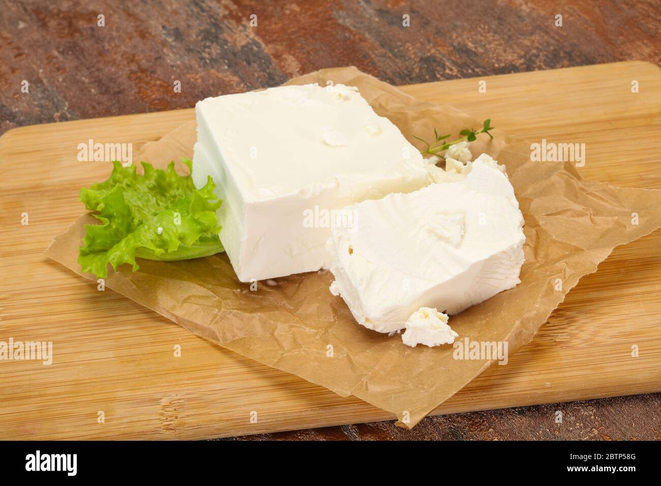 Greek traditional Feta soft cheese in the plate Stock Photo - Alamy