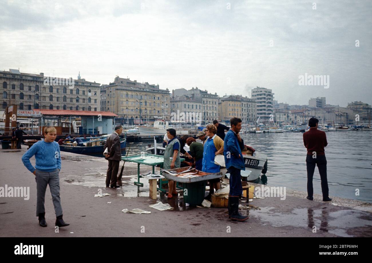French fisherman selling fish in the port of Marseille, France ...