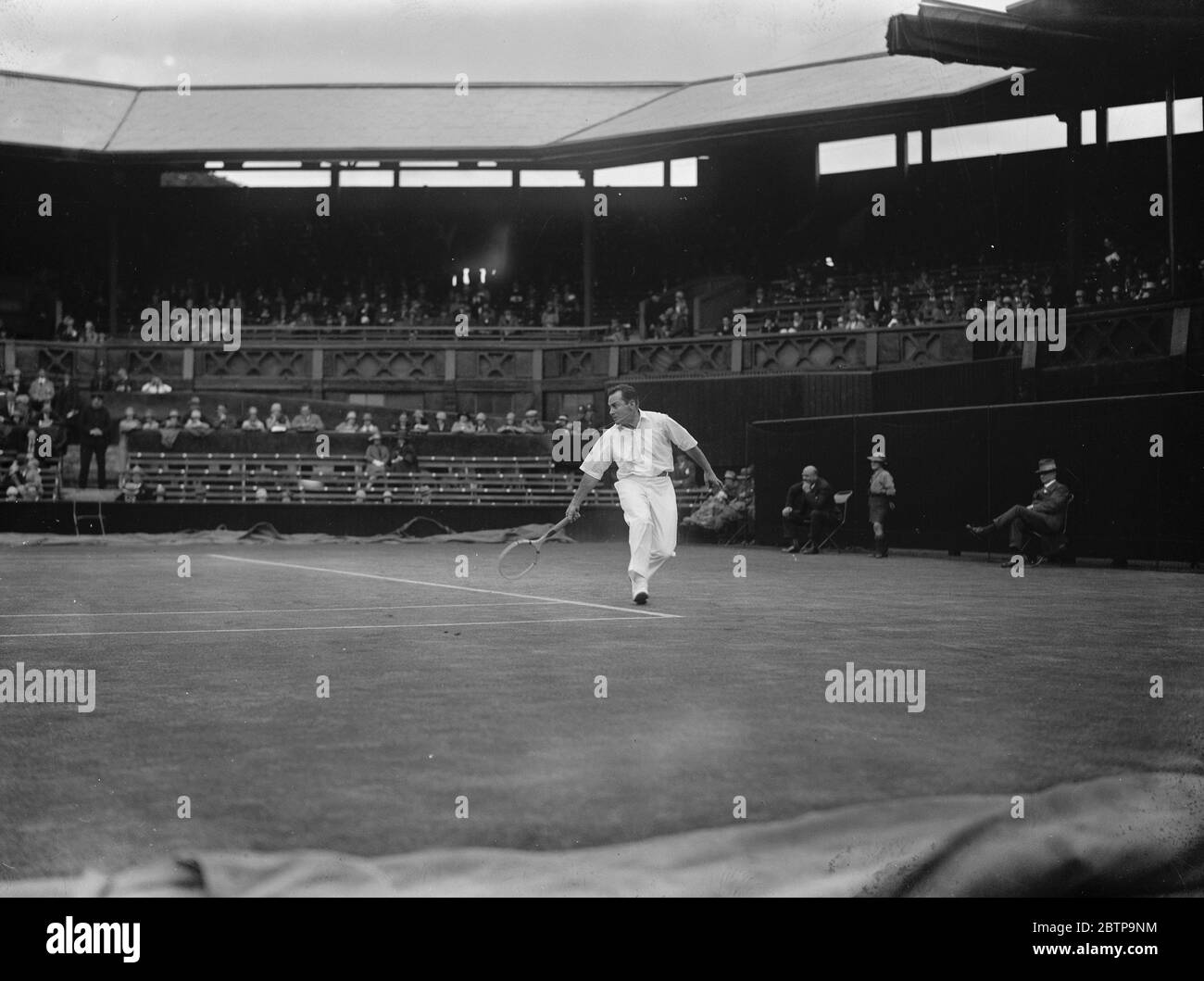 Lawn tennis at Wimbledon . Hunter in play . 24 June 1927 Stock Photo ...
