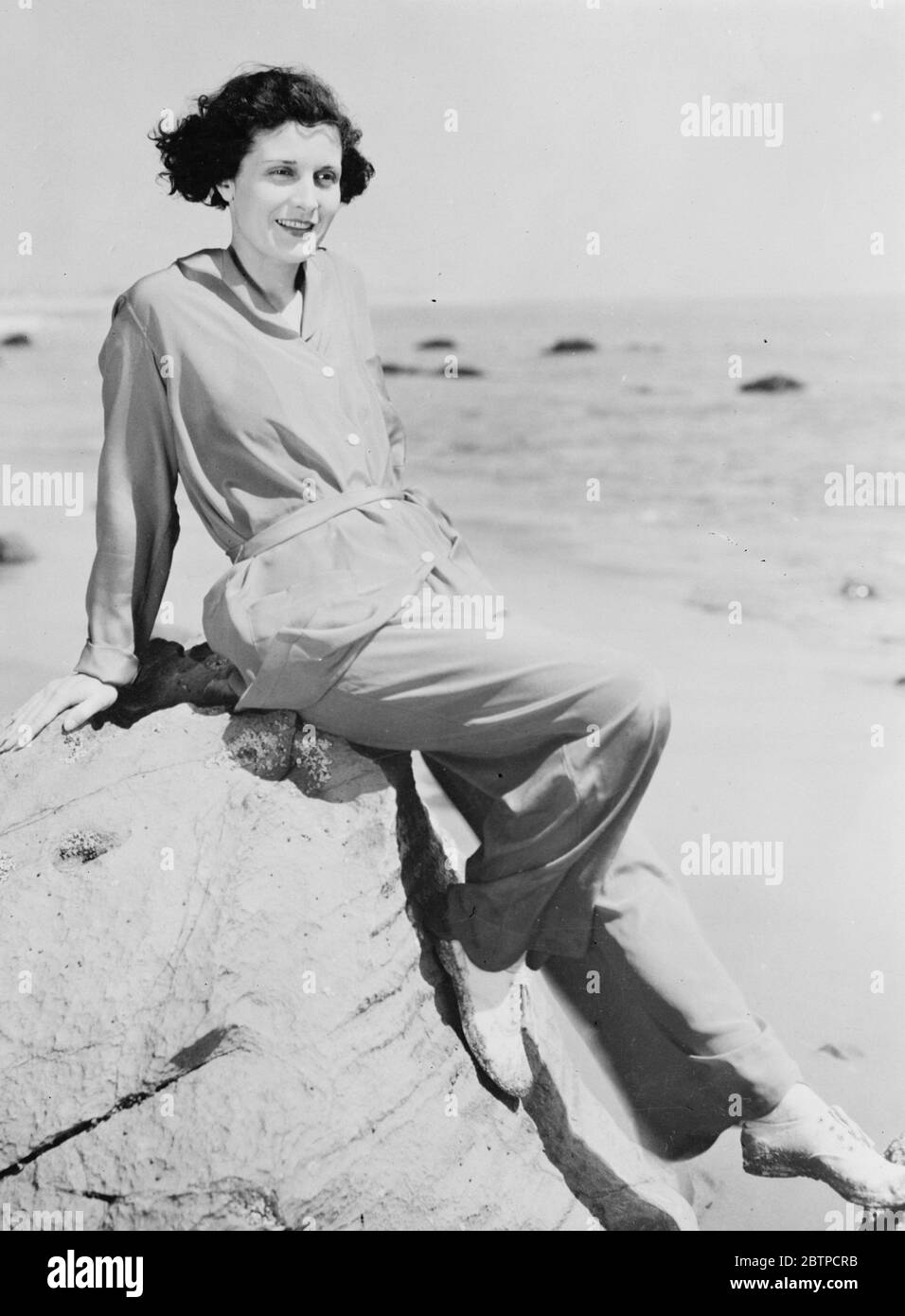 Wearing beach pyjamas . Miss Evelyn Brent , the well known American ...