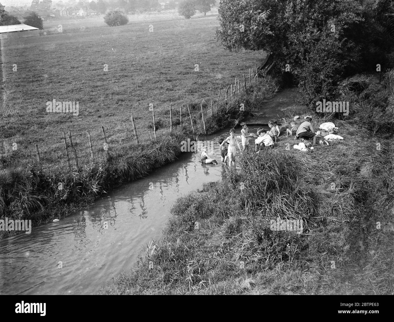 Child in stream Black and White Stock Photos & Images - Alamy