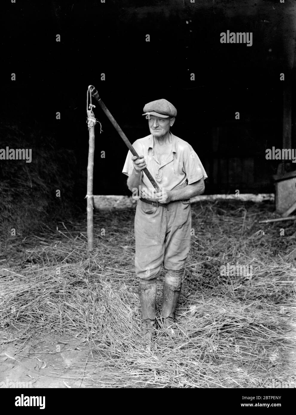 Jimmy Burrows and flail . 1935 Stock Photo - Alamy