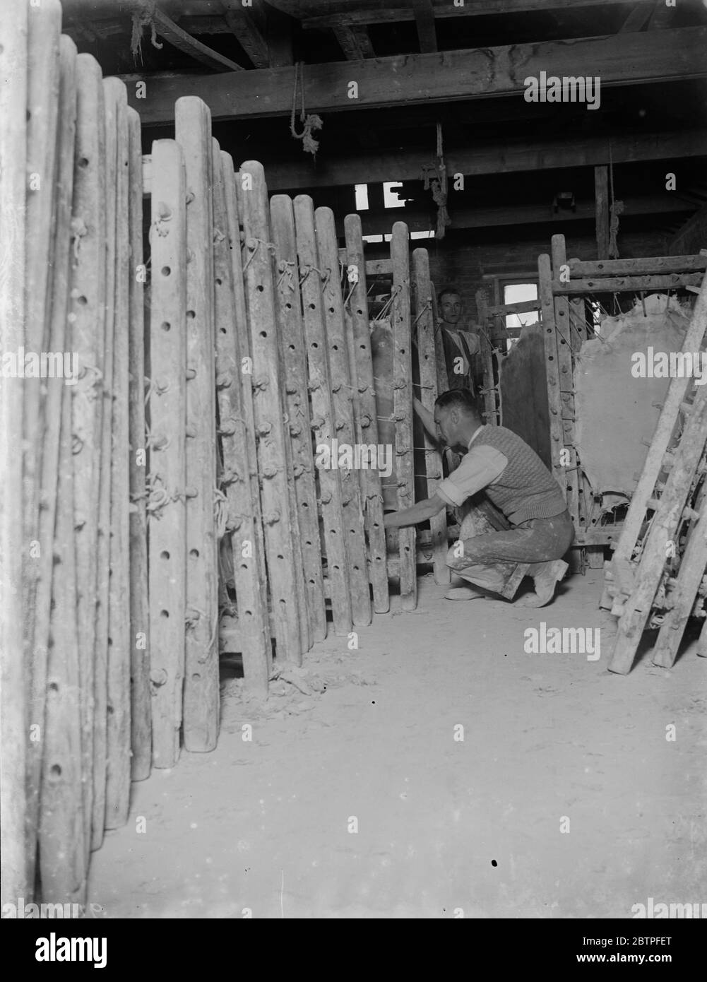 Vellum works series . The skins on their frames drying out . 1935 Stock ...