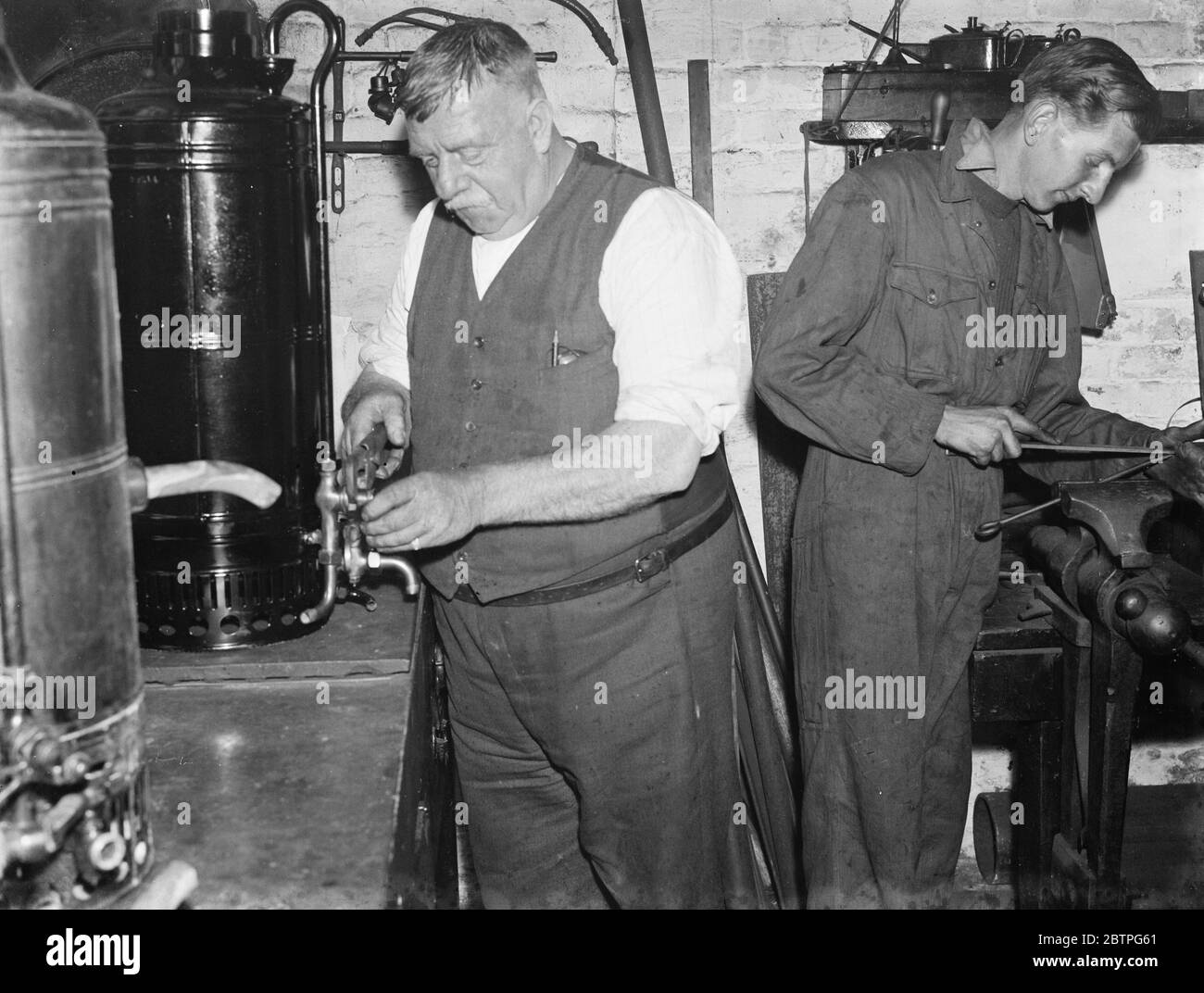Gravesend Gasworks in Kent. Men working in the fitting shop . 1939 ...