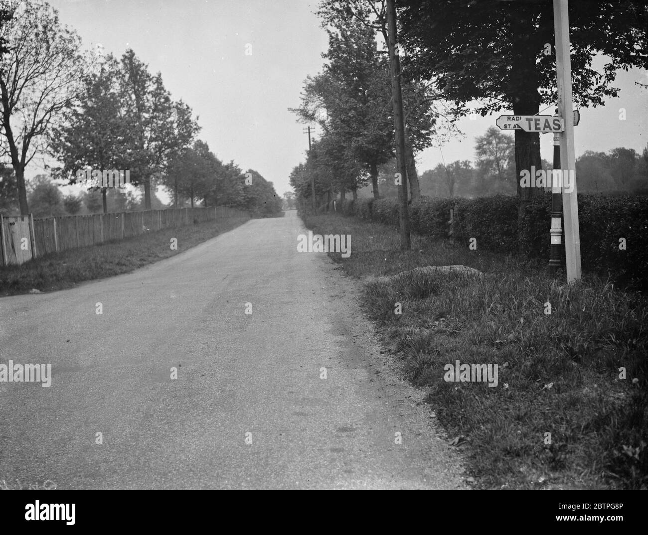 A road sign obscured. 1938 Stock Photo - Alamy
