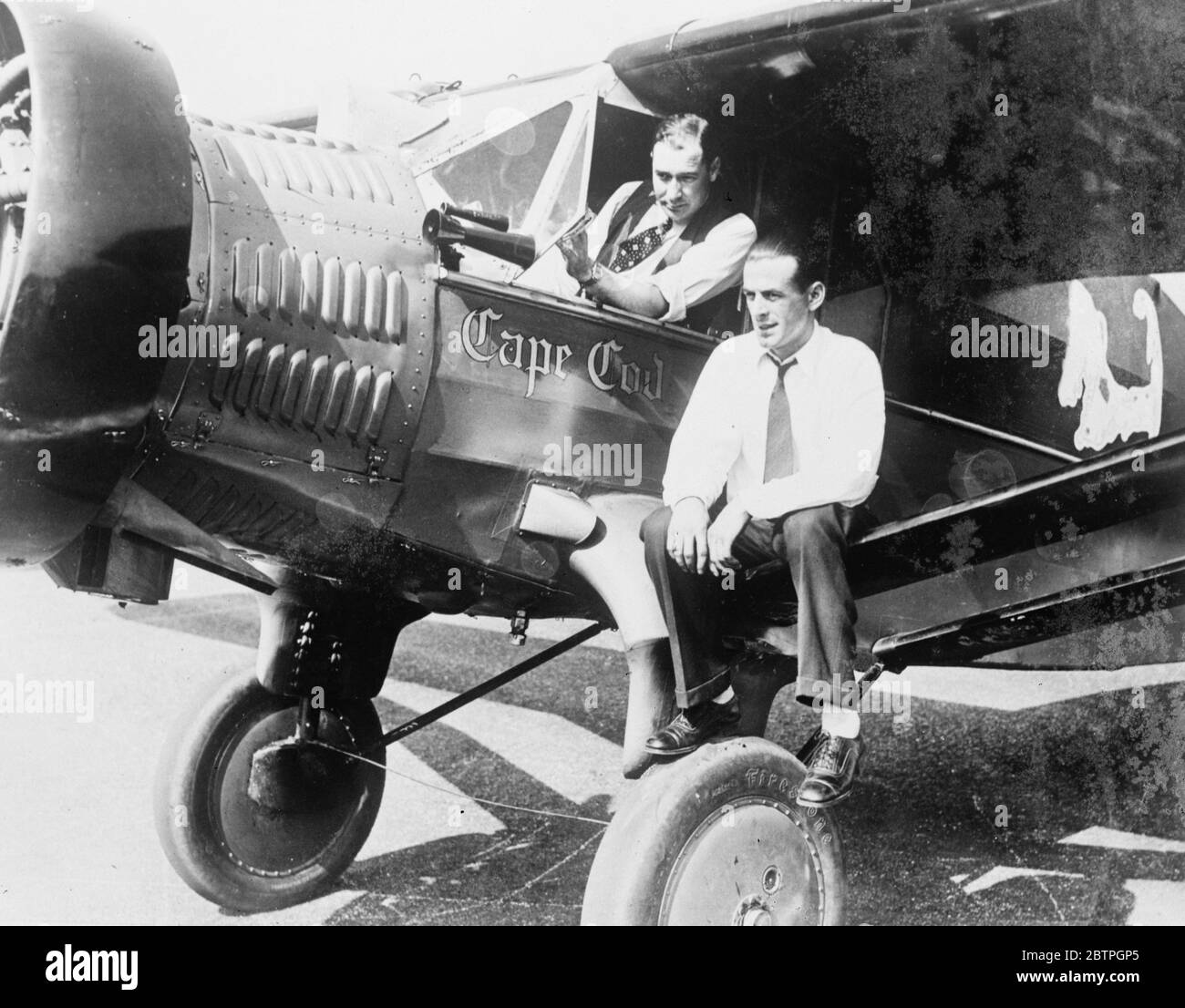 To attempt transatlantic flight . Russell Bradman in cockpit and John ...
