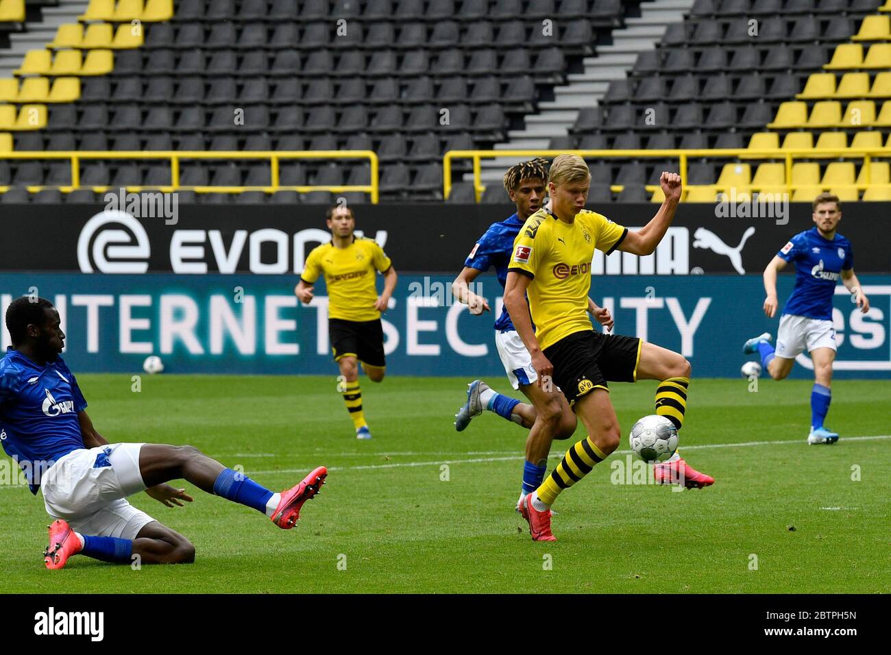 Dortmund's Erling Haaland, center right, scores the opening goal during ...