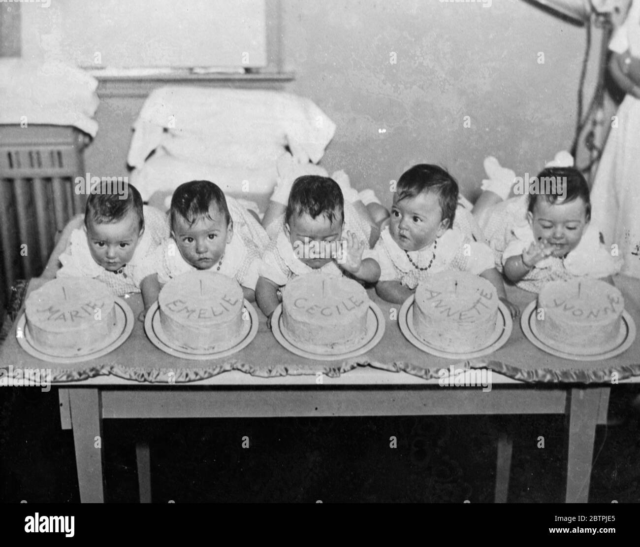 Dionne Quins . the quins with their birthday cake Stock Photo - Alamy