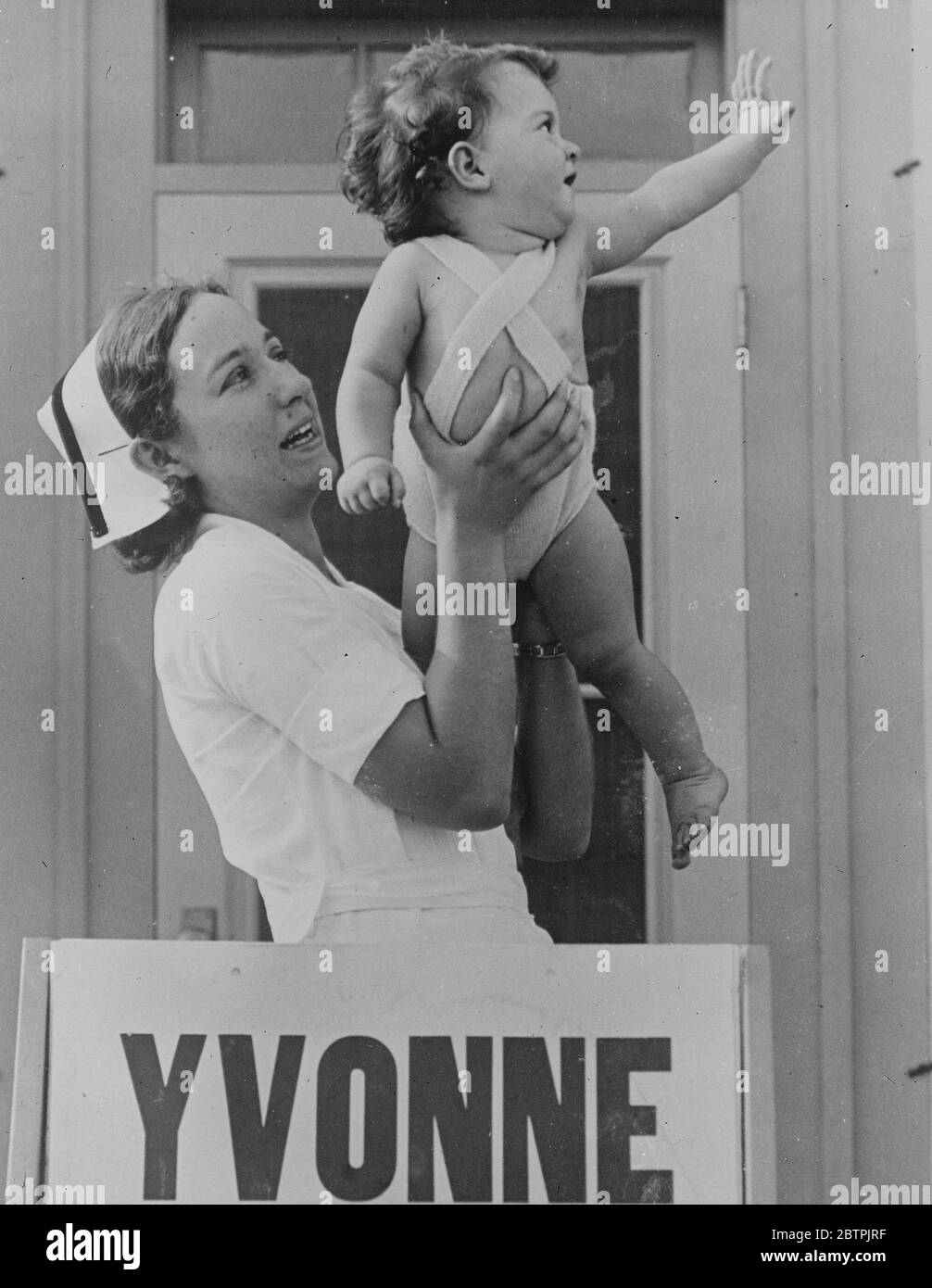 Yvonne waves triumphantly . Quins take their first steps unaided ...