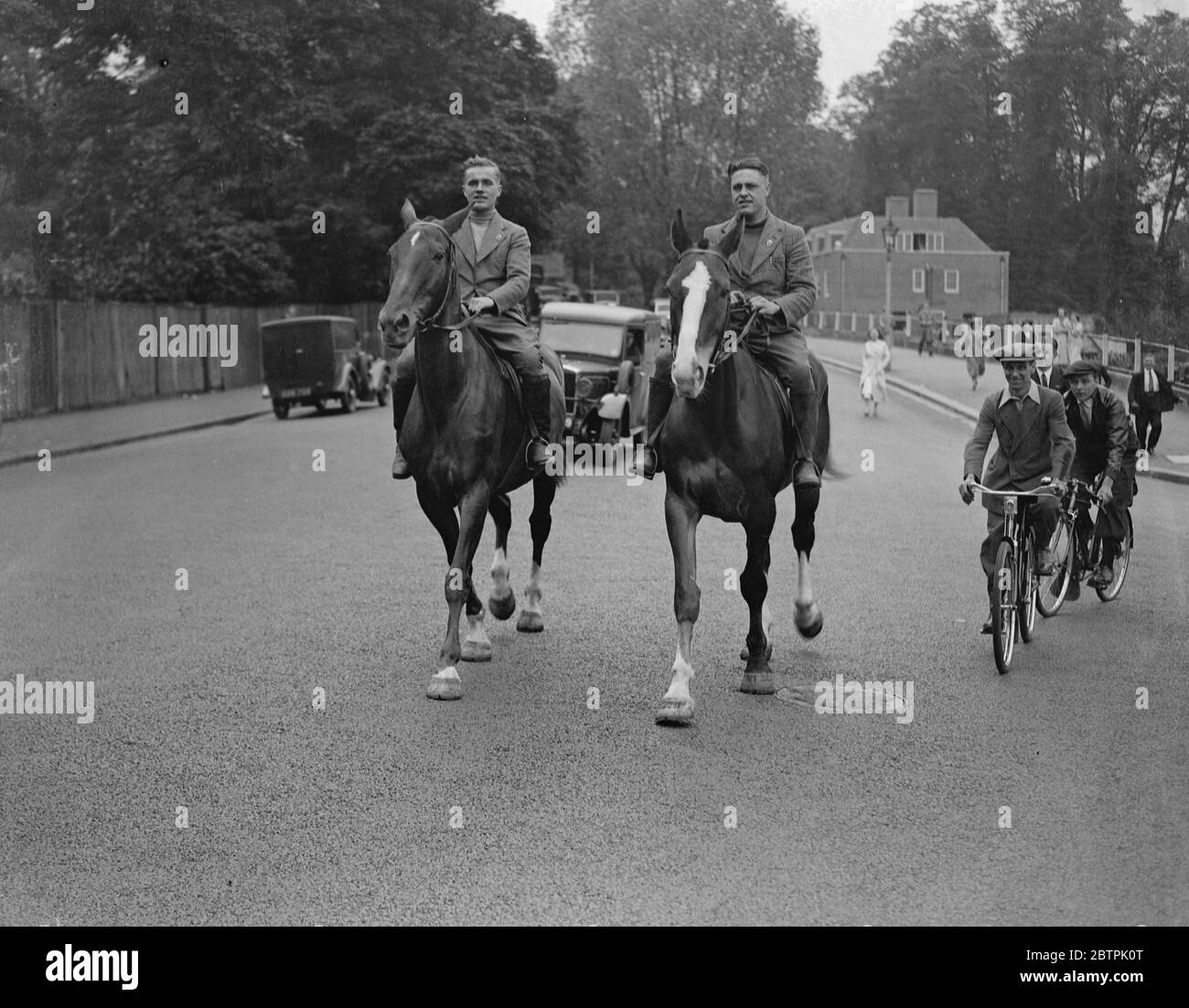Modern Dick Turpin . Speedway riders start race on horses . Two ...
