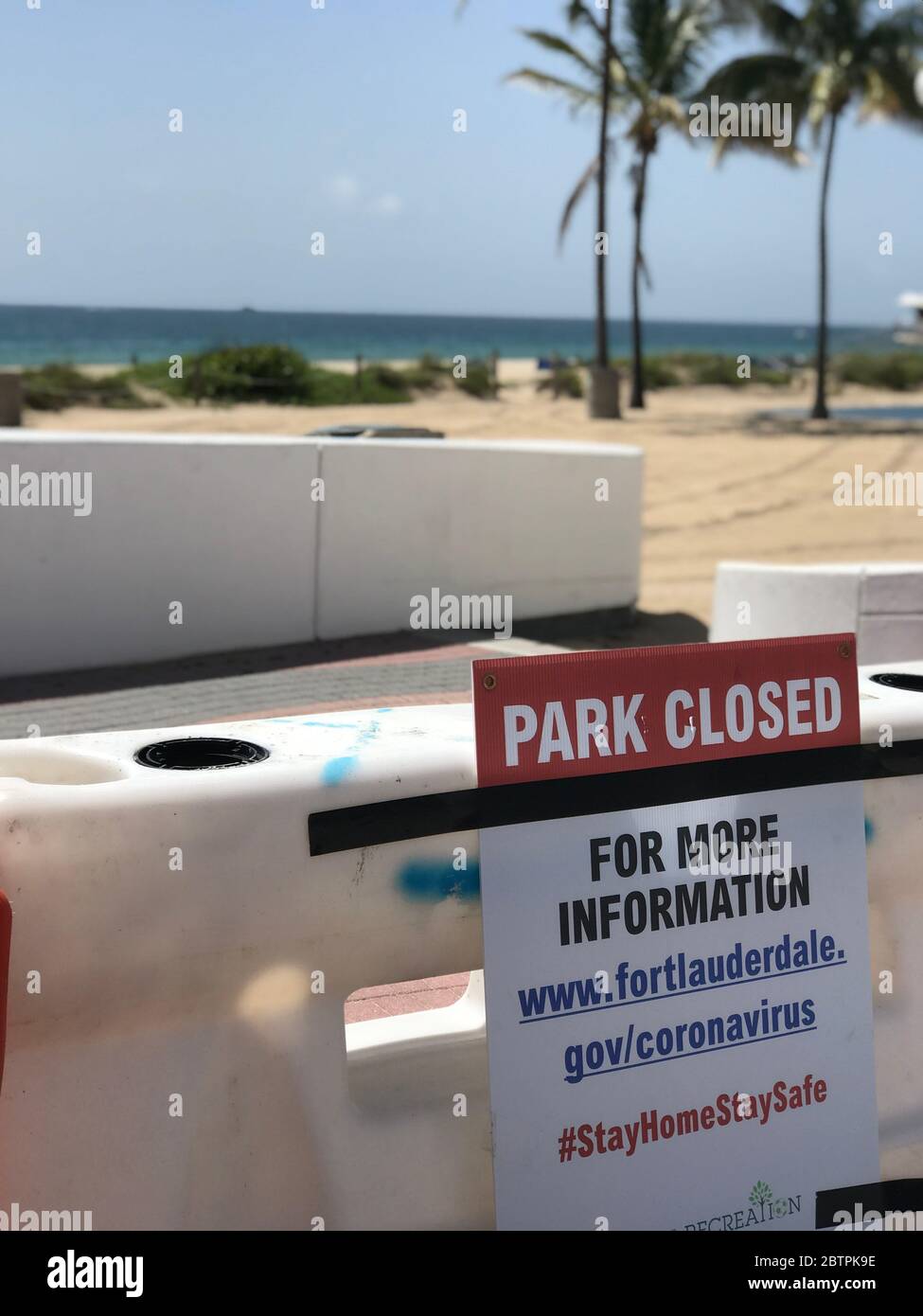 Sign Says Florida Beach Closed Due To Covid Pandemic Stock Photo - Alamy